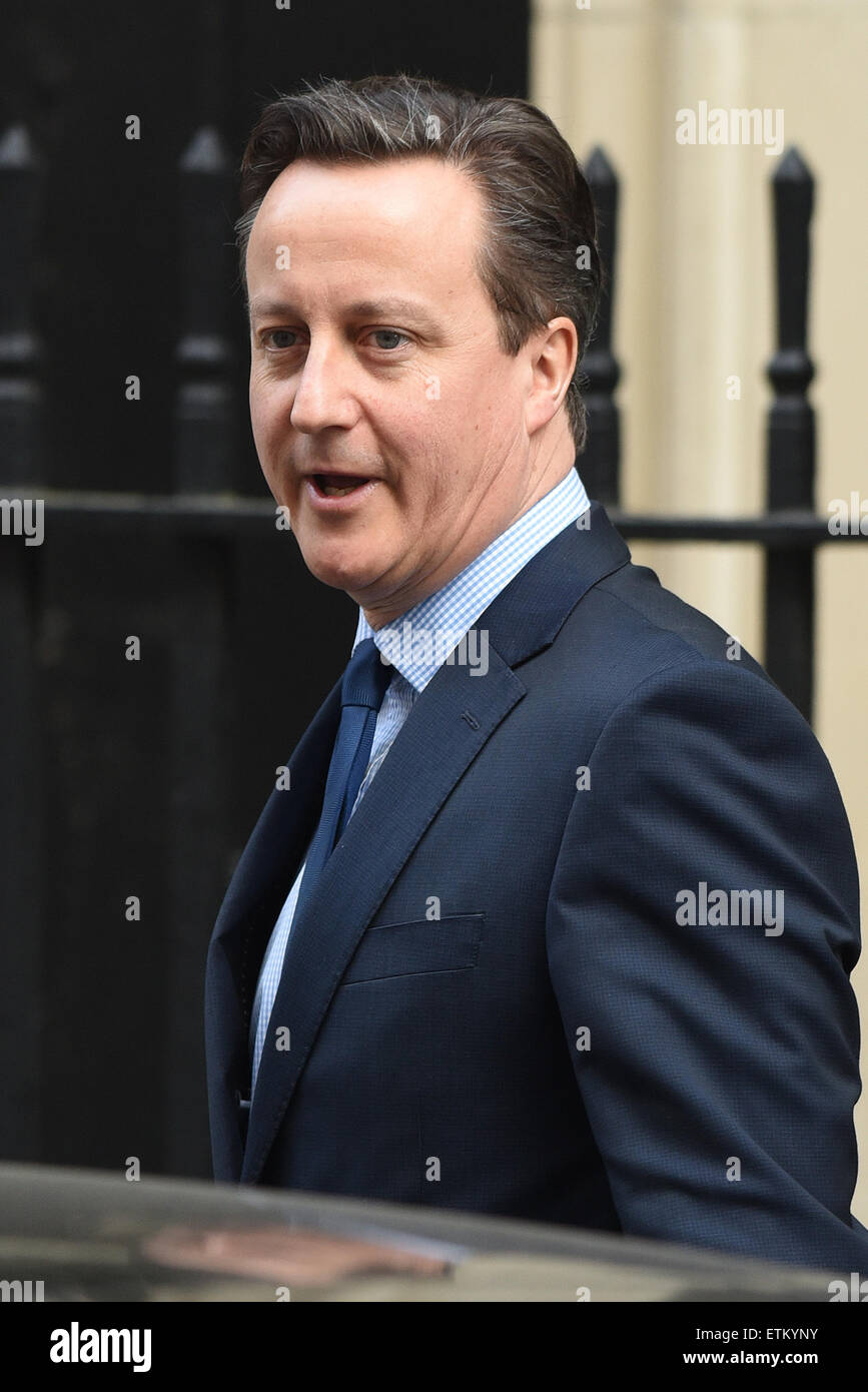 Prime Minister David Cameron leaves 10 Downing Street on his way to the ...