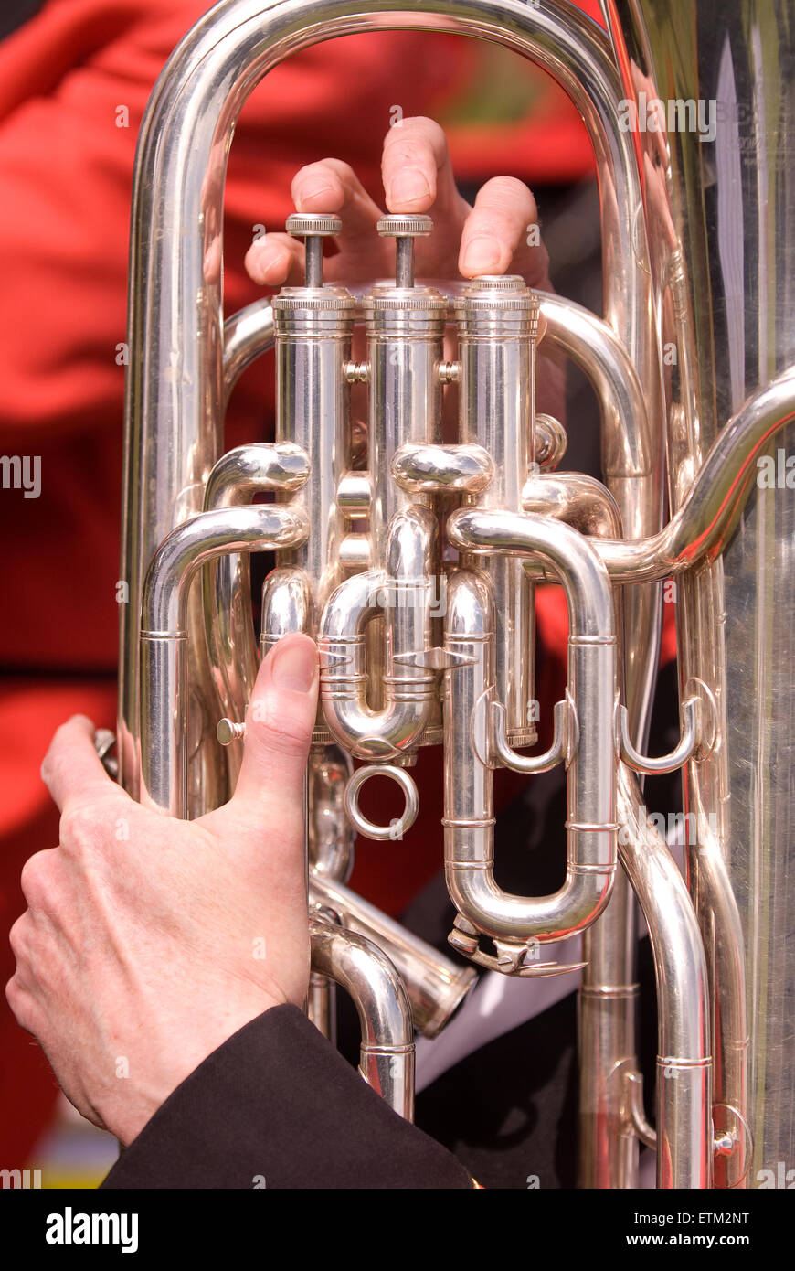 Member of Farnham Brass Band entertaining the crowds at Churt fete ...