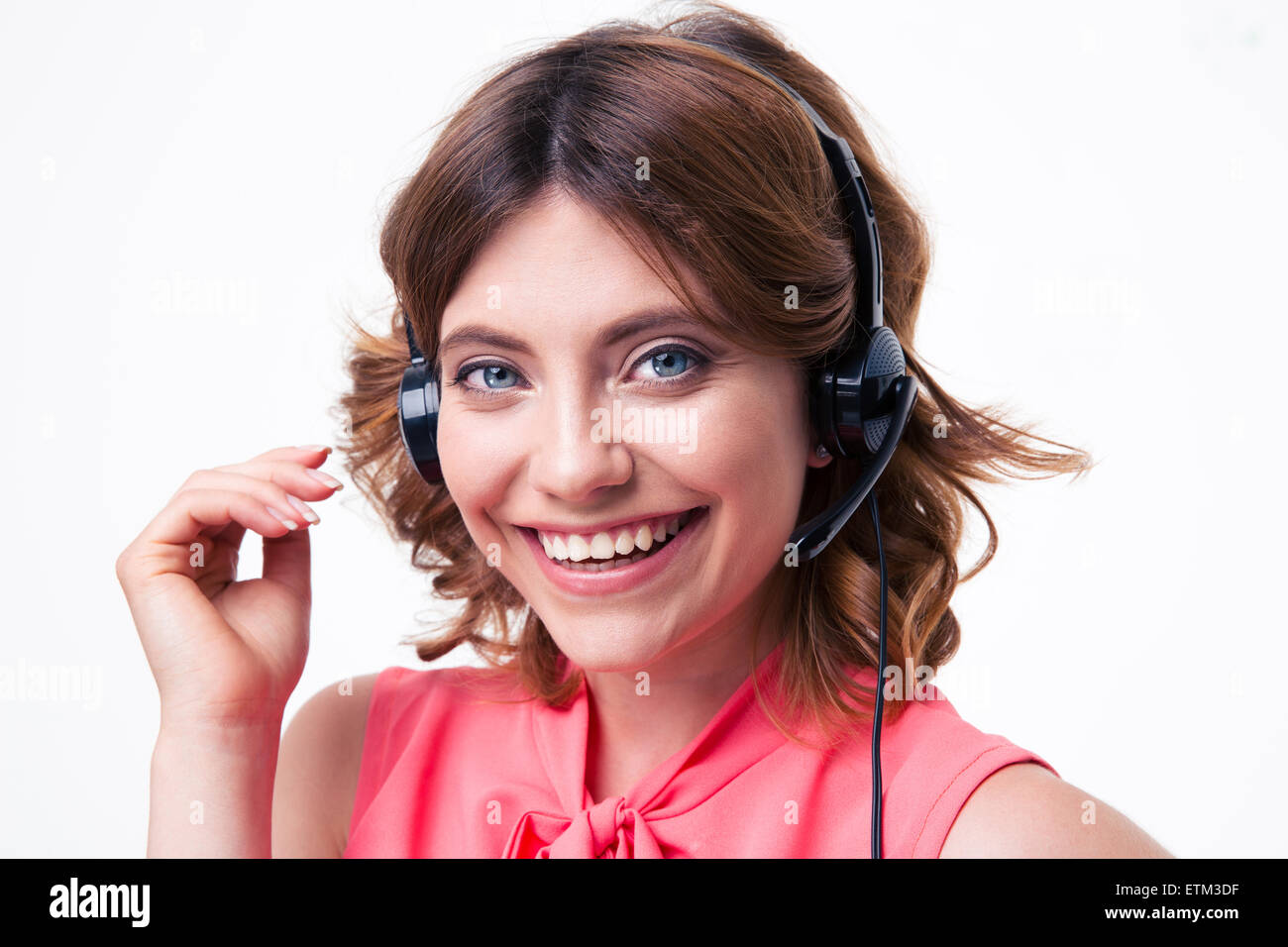 Portrait of a happy female customer service operator isolated on a ...