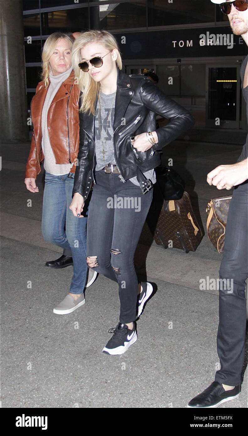 Chloe Grace Moretz with her brother and mother arrive at Los Angeles ...
