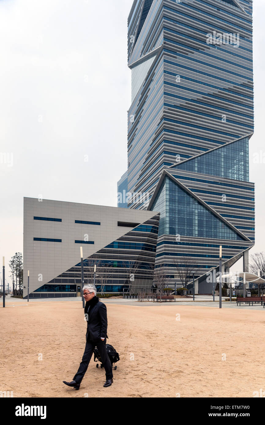 Exterior facade with triangular fenestration voids. G-Tower in Incheon ...