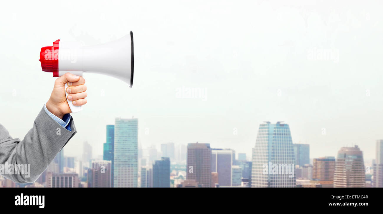 business man hand holding megaphone Stock Photo - Alamy