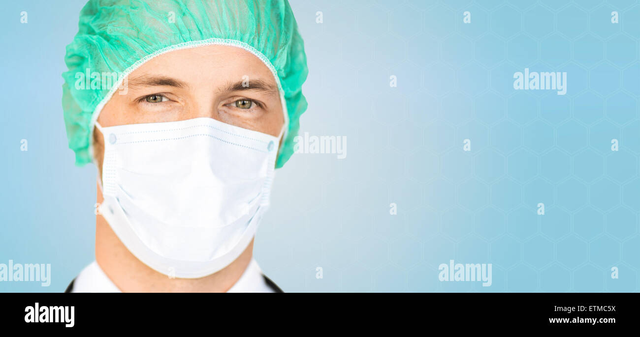 male surgeon face in medical cap and mask Stock Photo - Alamy