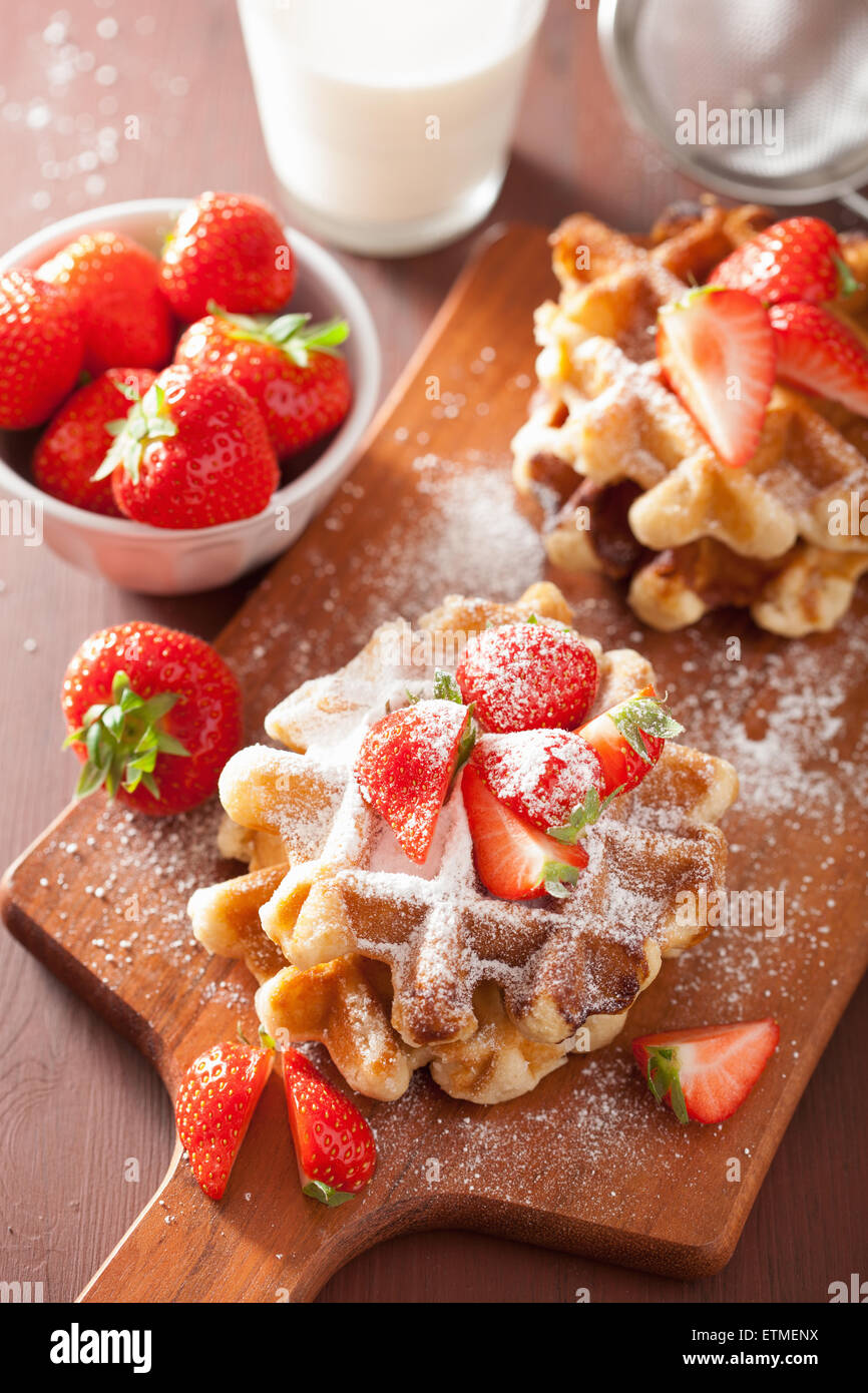 belgian waffles with icing sugar and strawberry Stock Photo - Alamy