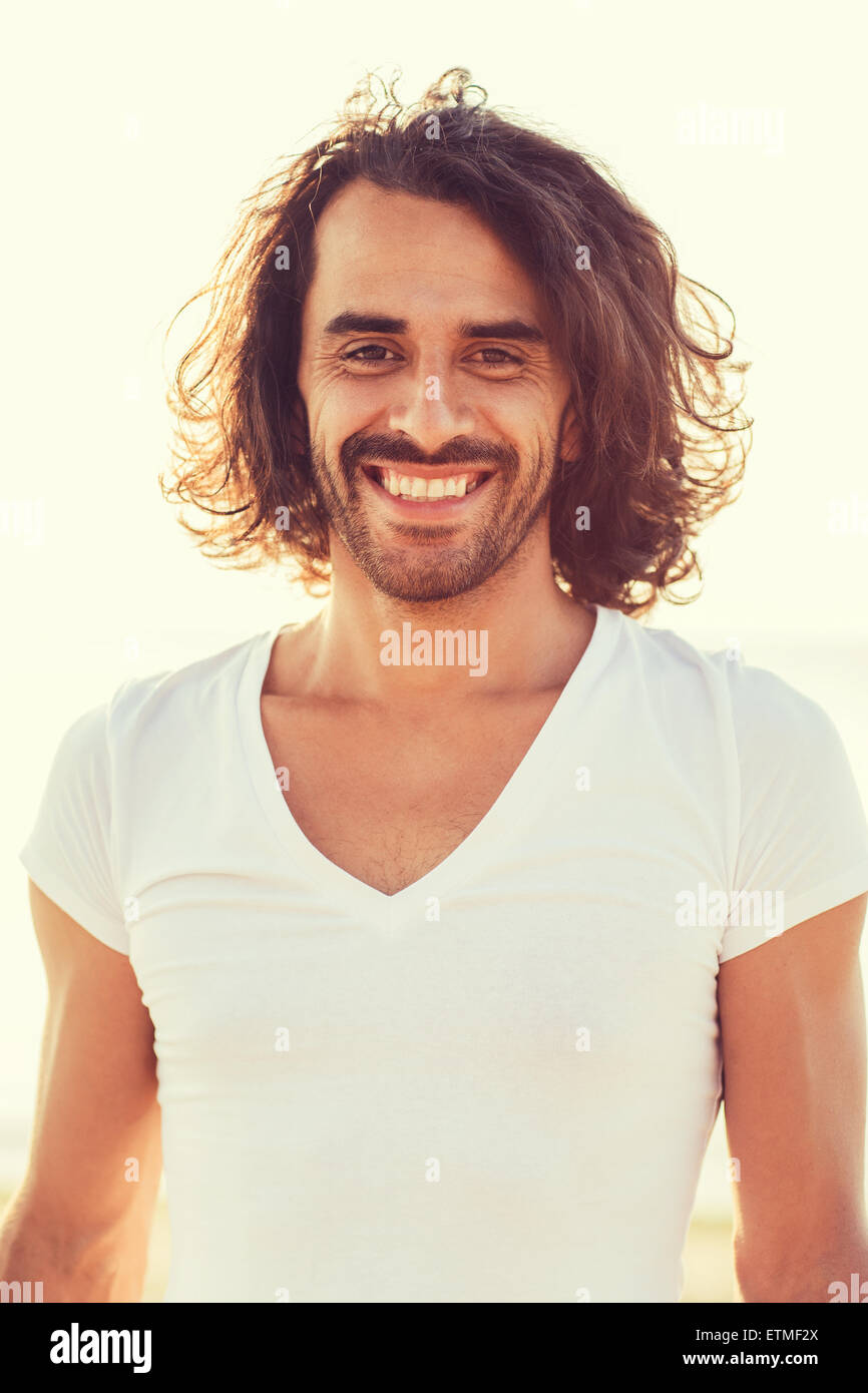 smiling man in white blank shirt outdoors Stock Photo - Alamy