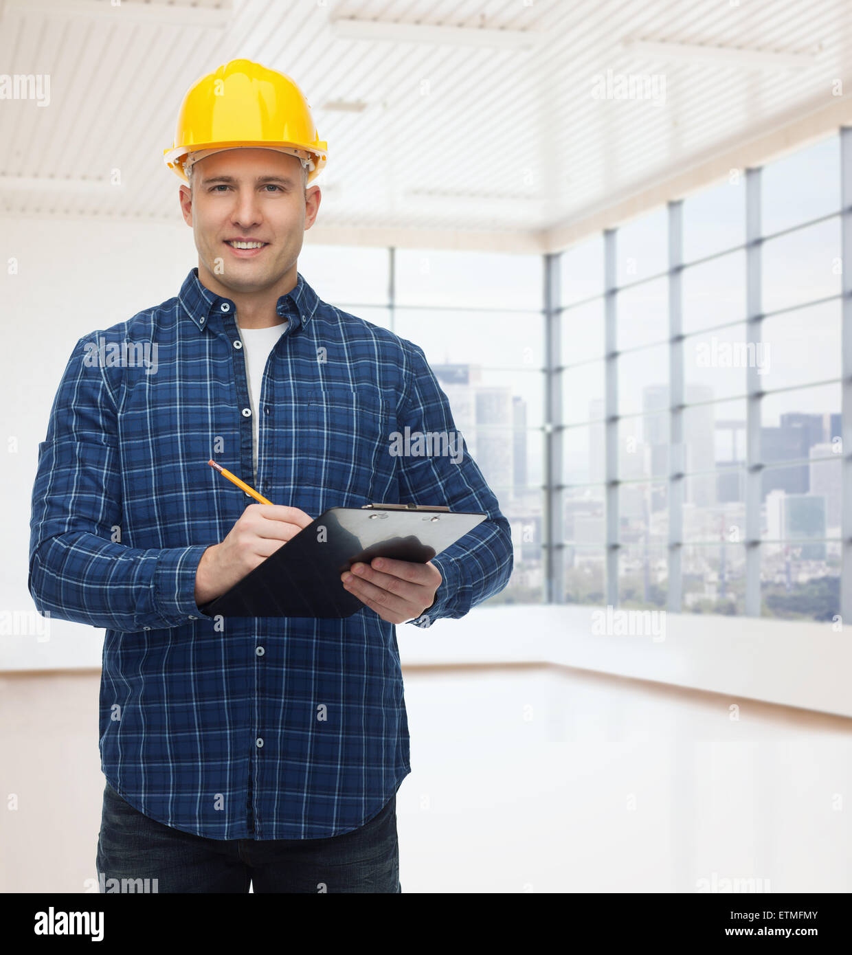 Professional foreman filling in documents hi-res stock photography and ...