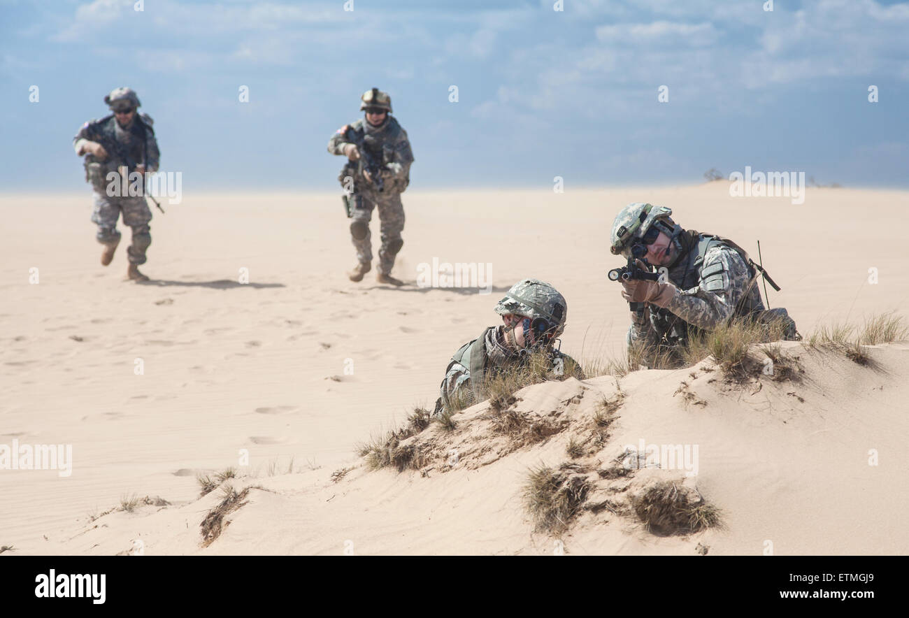 infantrymen in action Stock Photo - Alamy