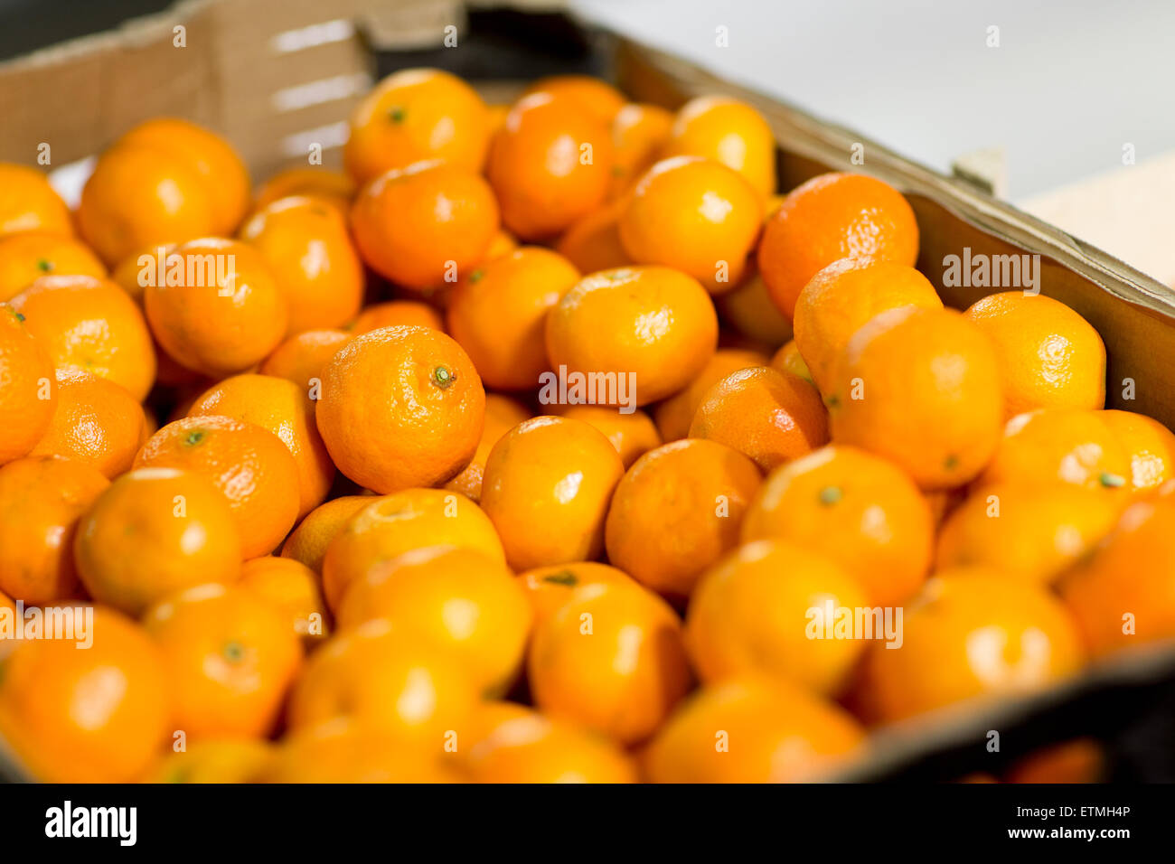 ripe mandarins at food market or farm Stock Photo - Alamy