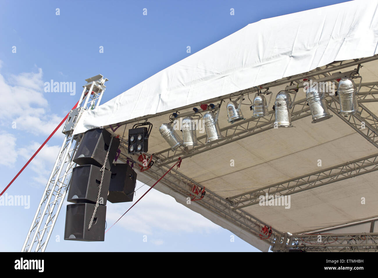Outdoor concert stage roof construction with speakers over sky Stock ...
