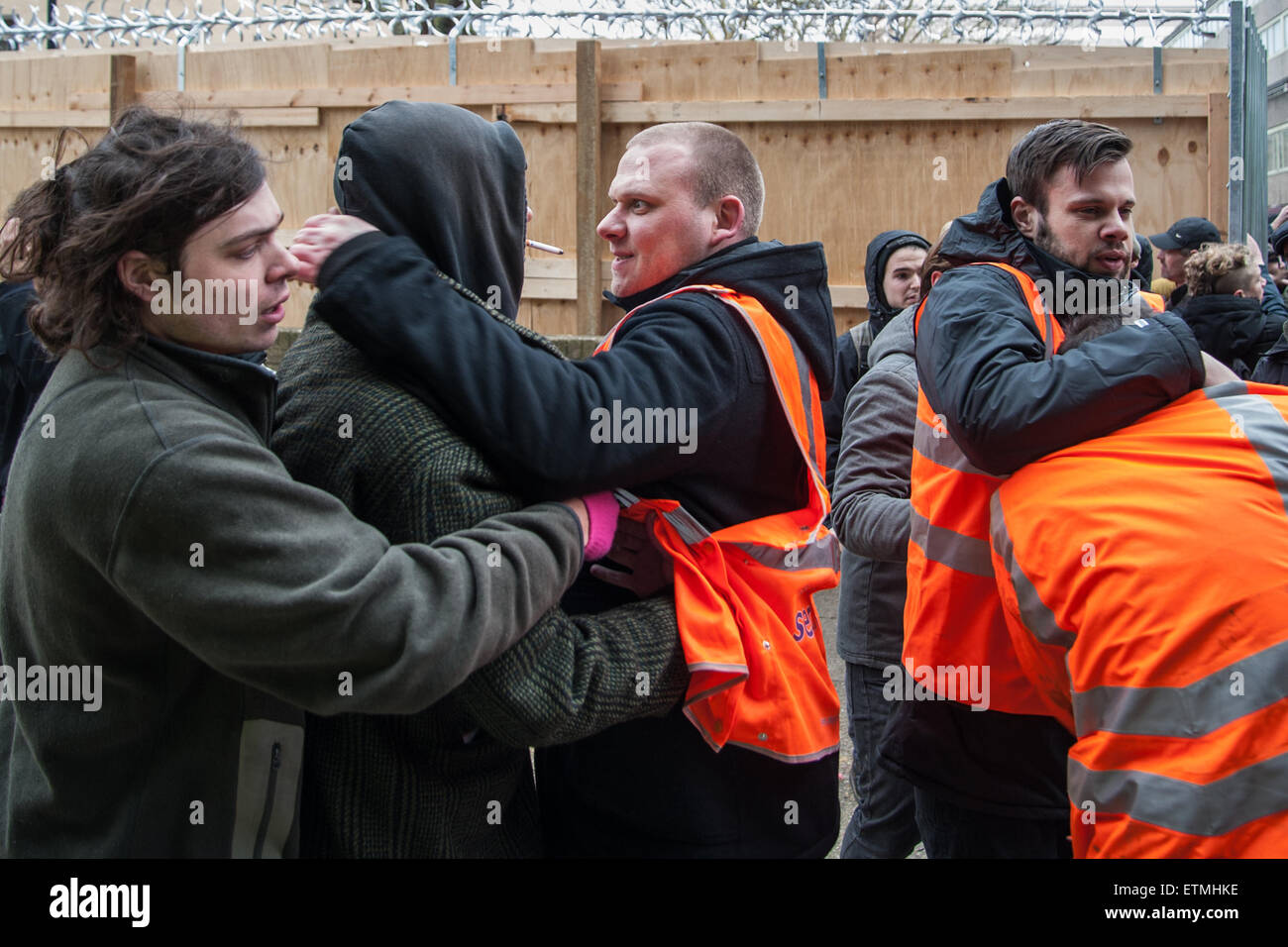 Activists clash with police and security guards at a protest against ...