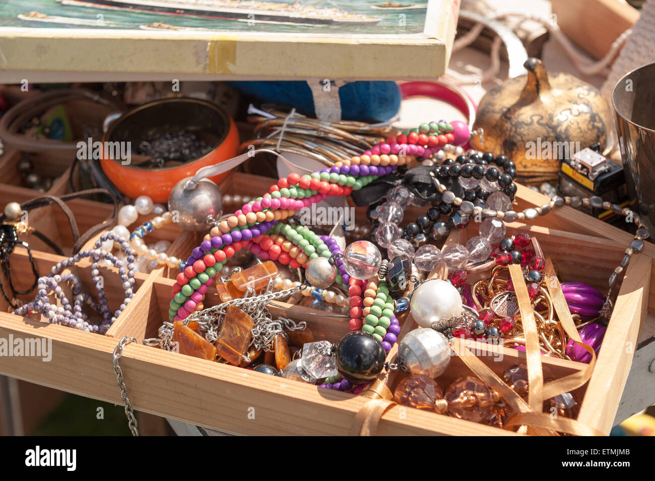 Typical display of household items for sale laid out on table at car ...