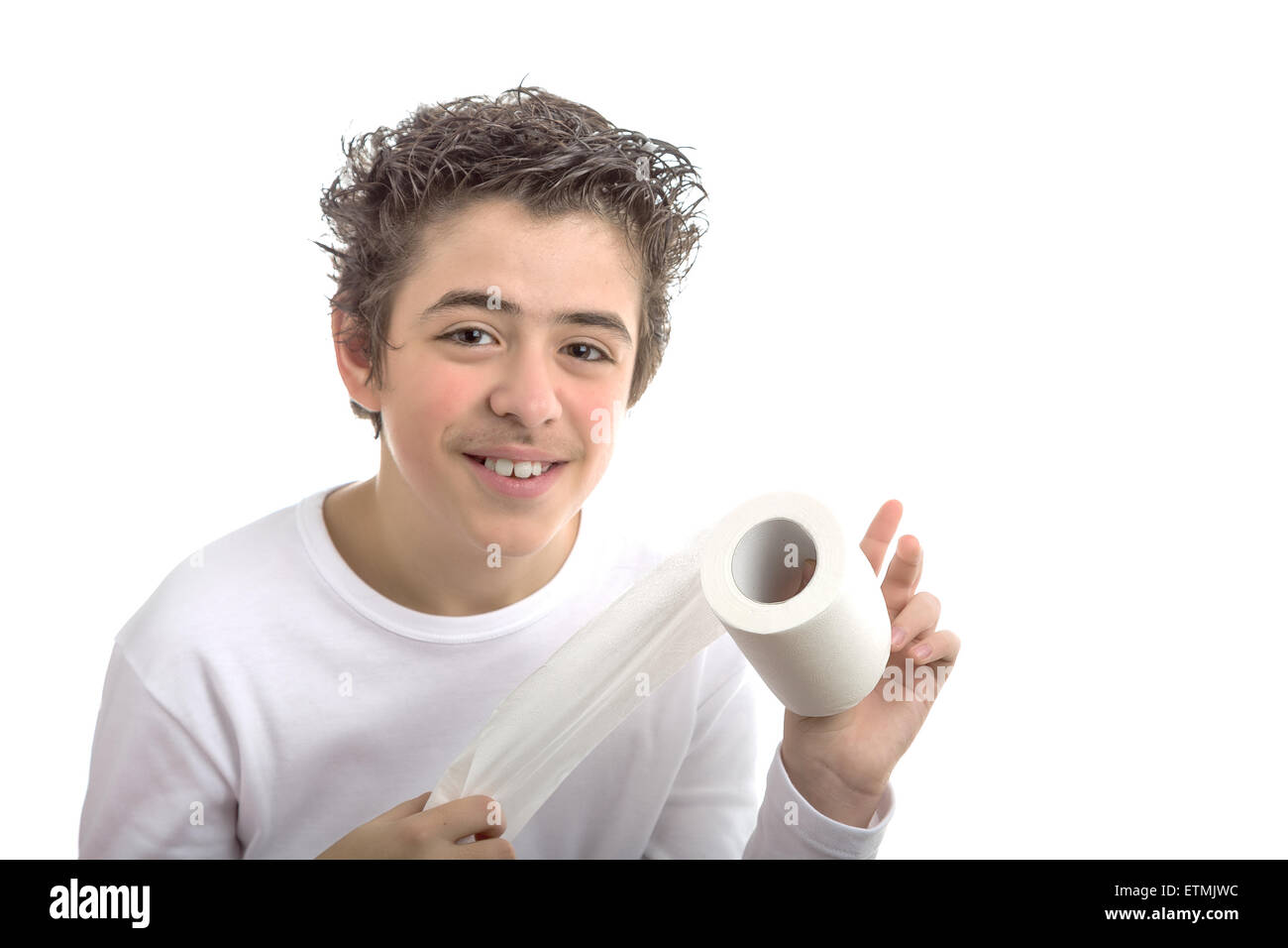 A cute Hispanic boy holds a blank white toilet paper roll with right ...