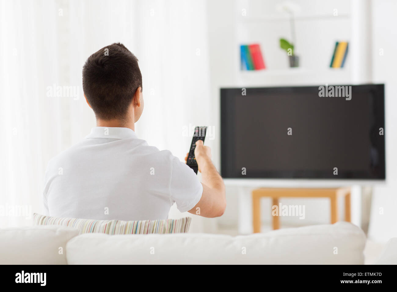 Changing channels man hi-res stock photography and images - Alamy