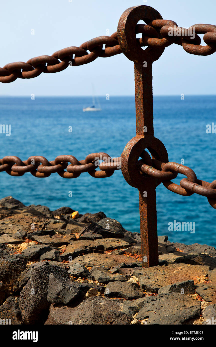 rusty chain water boat yacht coastline and summer in lanzarote spain ...