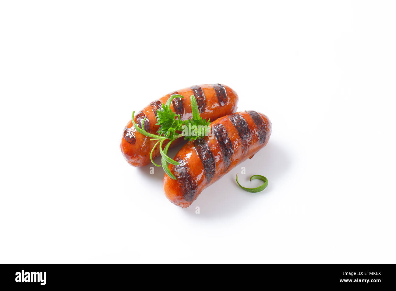two grilled sausages on white background Stock Photo - Alamy