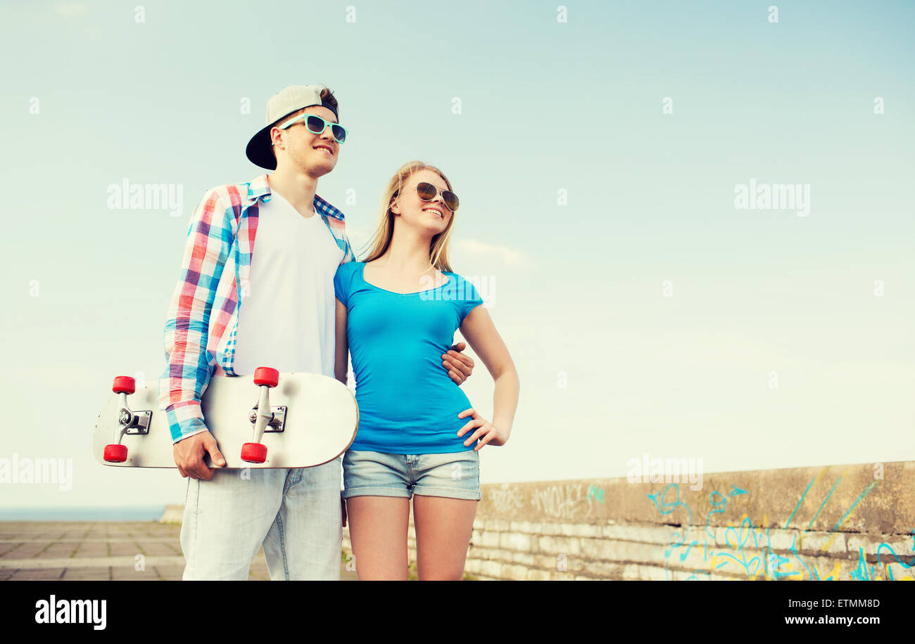 smiling couple having fun outdoors Stock Photo - Alamy