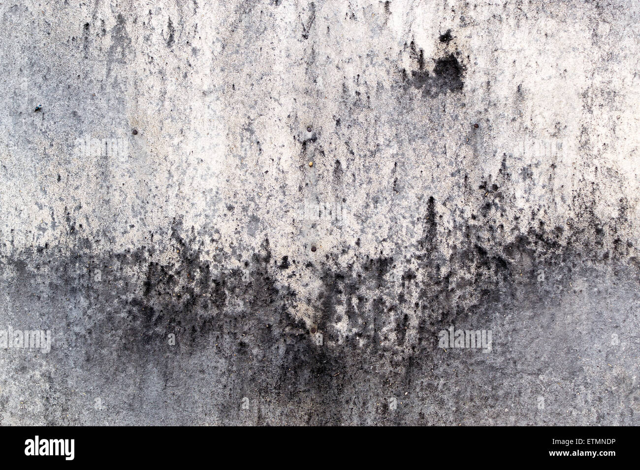 Soot grimed concrete wall with smoke runs and burnt details Stock Photo ...