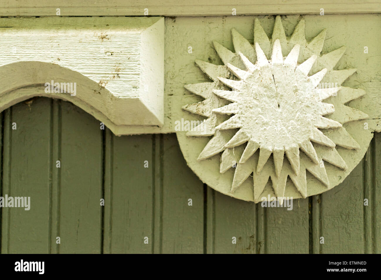 White painted wooden star shaped building details Stock Photo - Alamy
