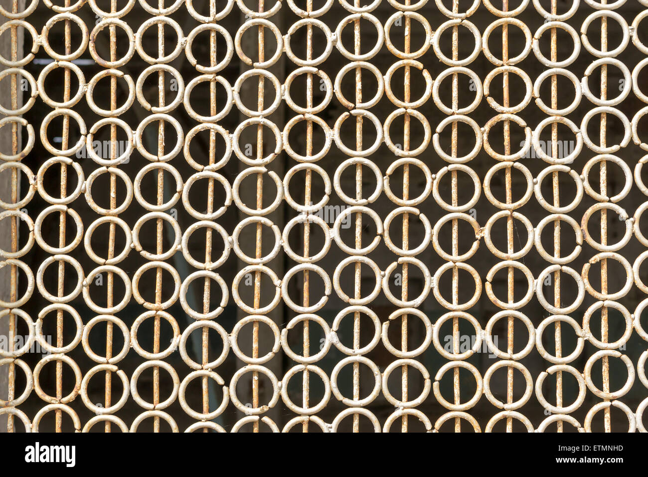 Old metal ringed wall barrier with empty background and no people Stock ...