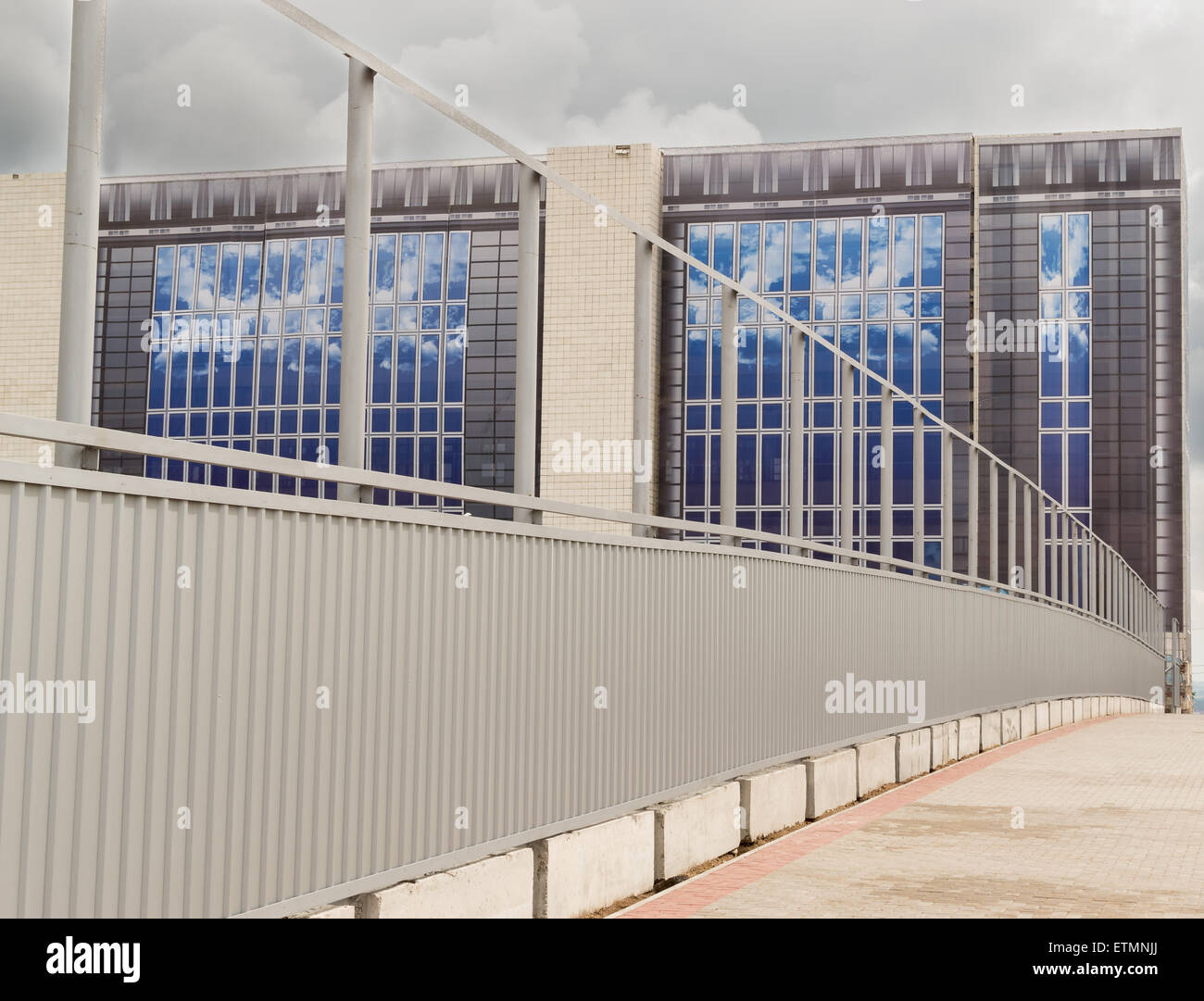Cloud pattern modern building facade against a grey sky Stock Photo - Alamy