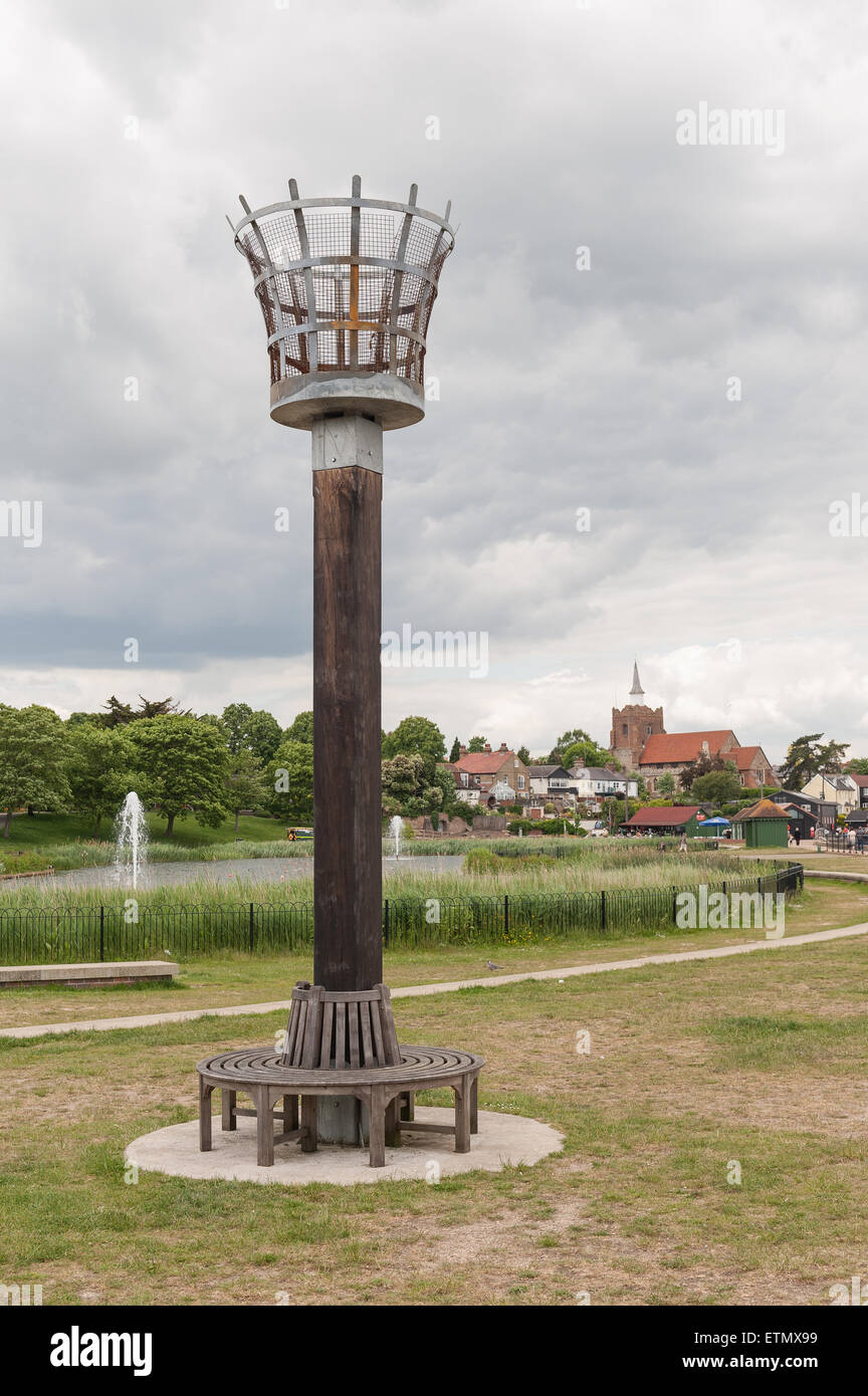 Maldon fire beacon stands out from the grey skyline and hillside view ...