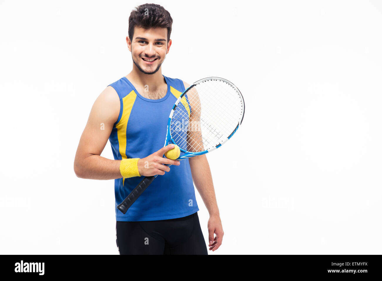 Cheerful man holding tennis racket and ball isolated on a white ...