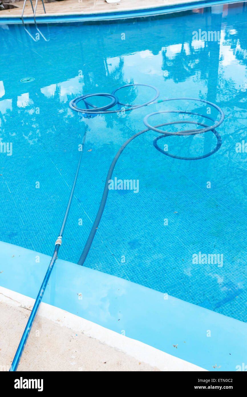 Process of cleaning swimming pool. Outdoors Stock Photo - Alamy