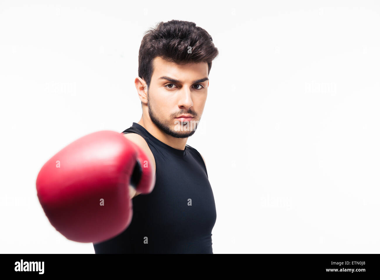 Male boxer hitting at camera isolated on a white background Stock Photo ...