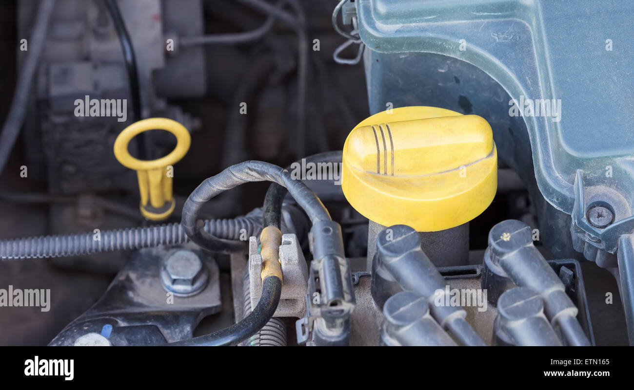 Closeup parts of car engine. Checking oil Stock Photo - Alamy