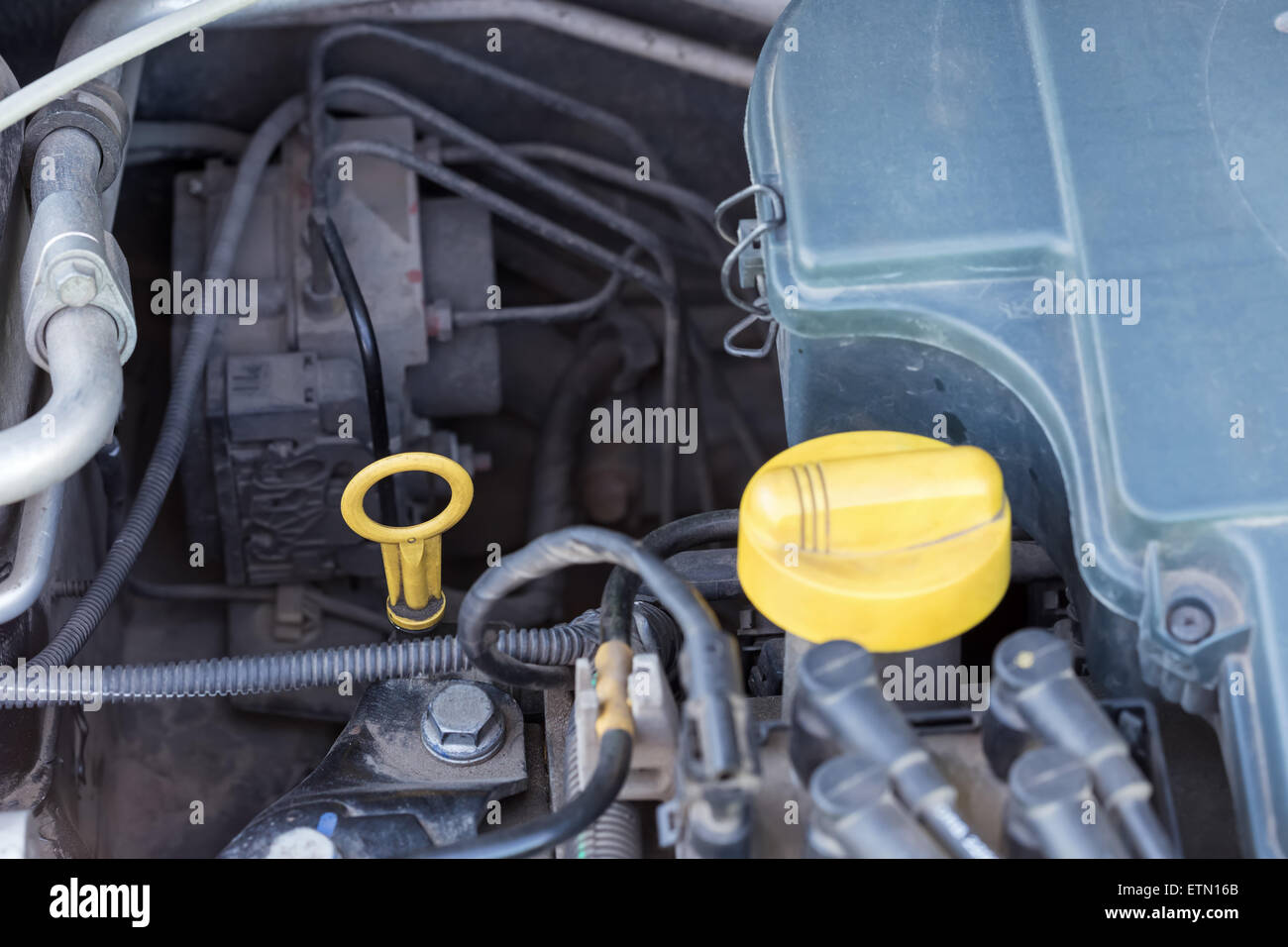 Closeup parts of car engine. Checking oil Stock Photo - Alamy