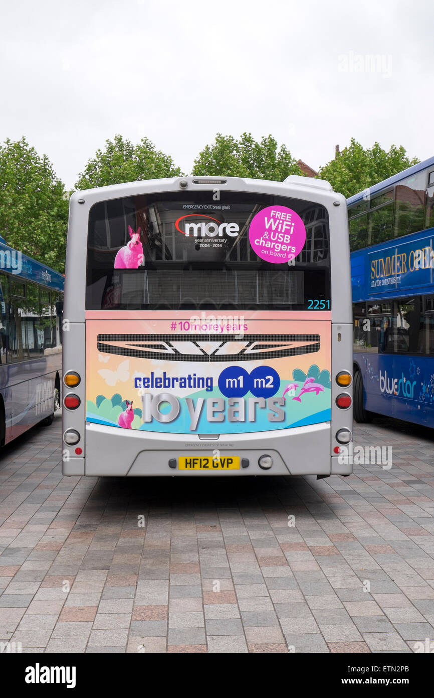 Advertisement on back of public transport bus UK Stock Photo - Alamy