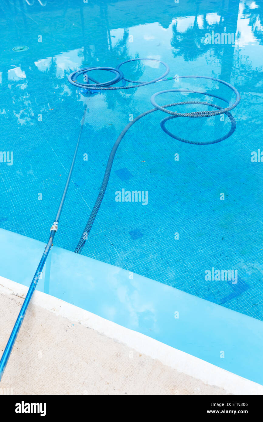 Process of cleaning swimming pool. Outdoors Stock Photo - Alamy