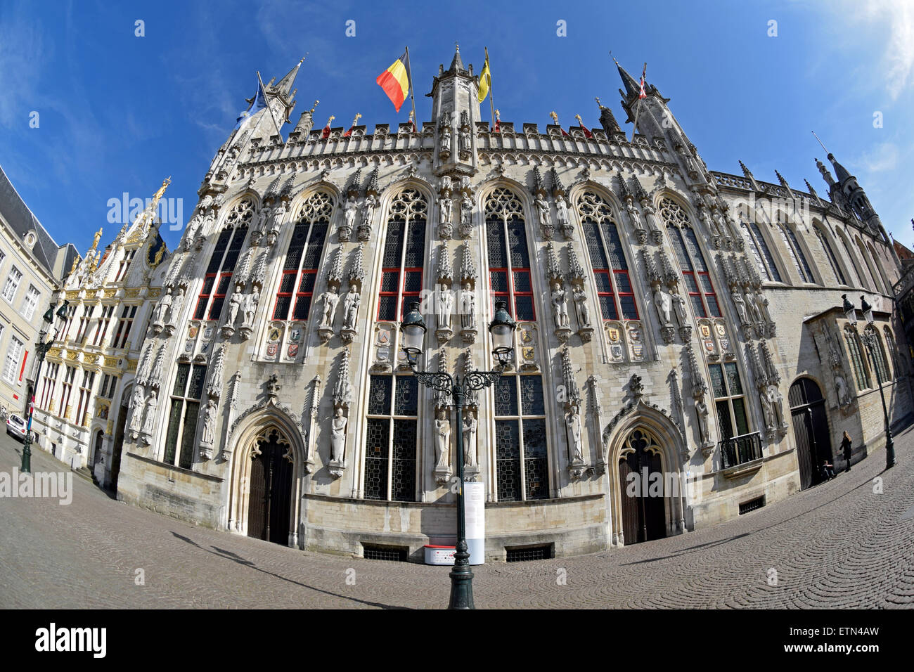 A fisheye lens view of Town Hall in Burg Square in Brugges, Belgium ...