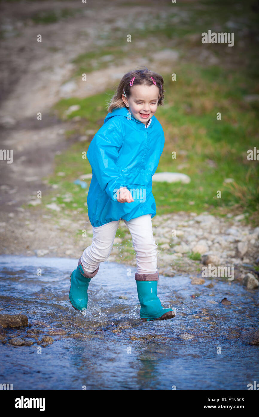 Puddle running hi-res stock photography and images - Alamy