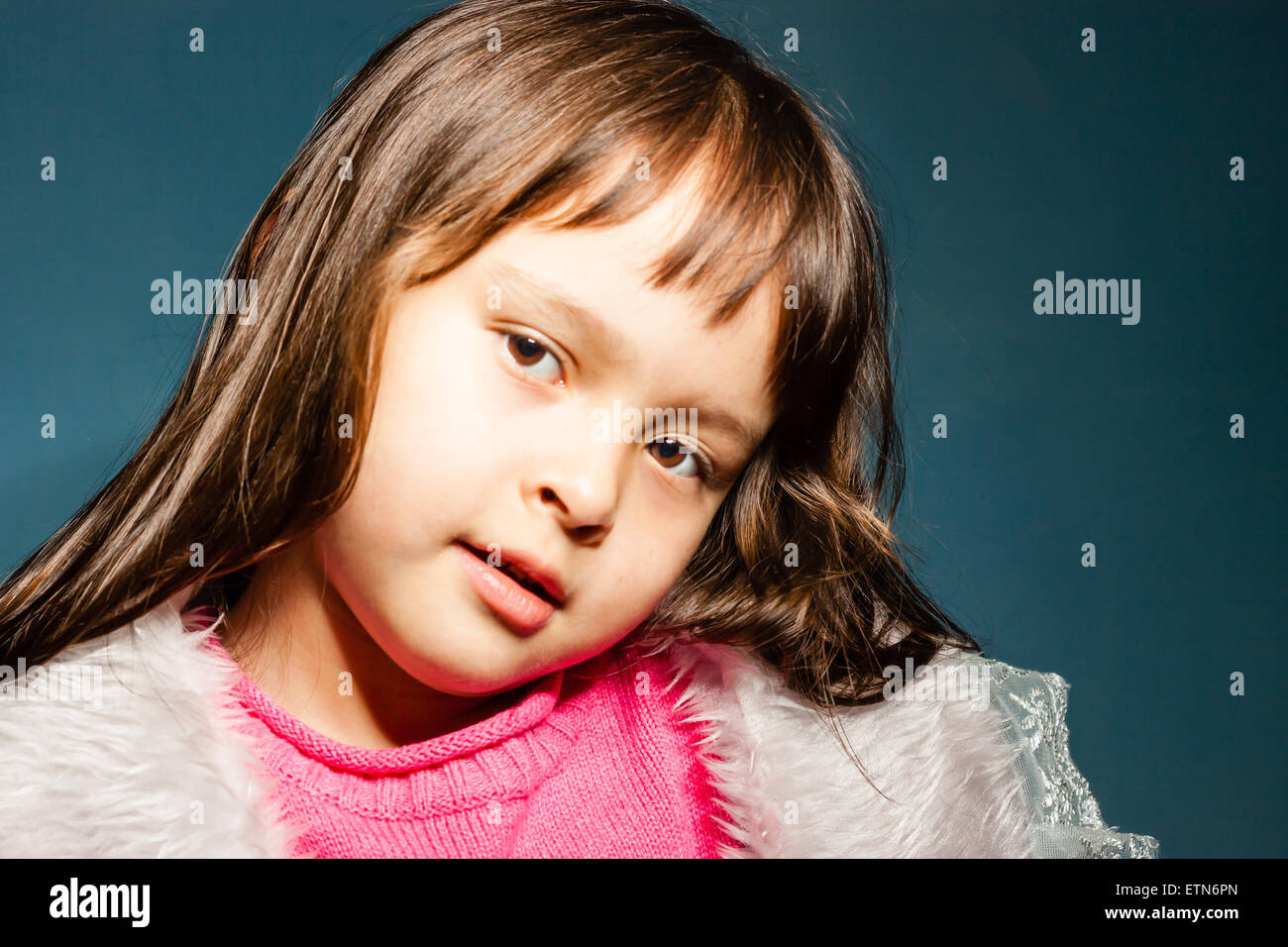 Portrait of young girl, looking at camera Stock Photo - Alamy