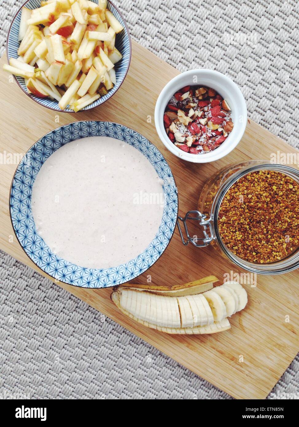 Raw oat porridge and toppings Stock Photo - Alamy