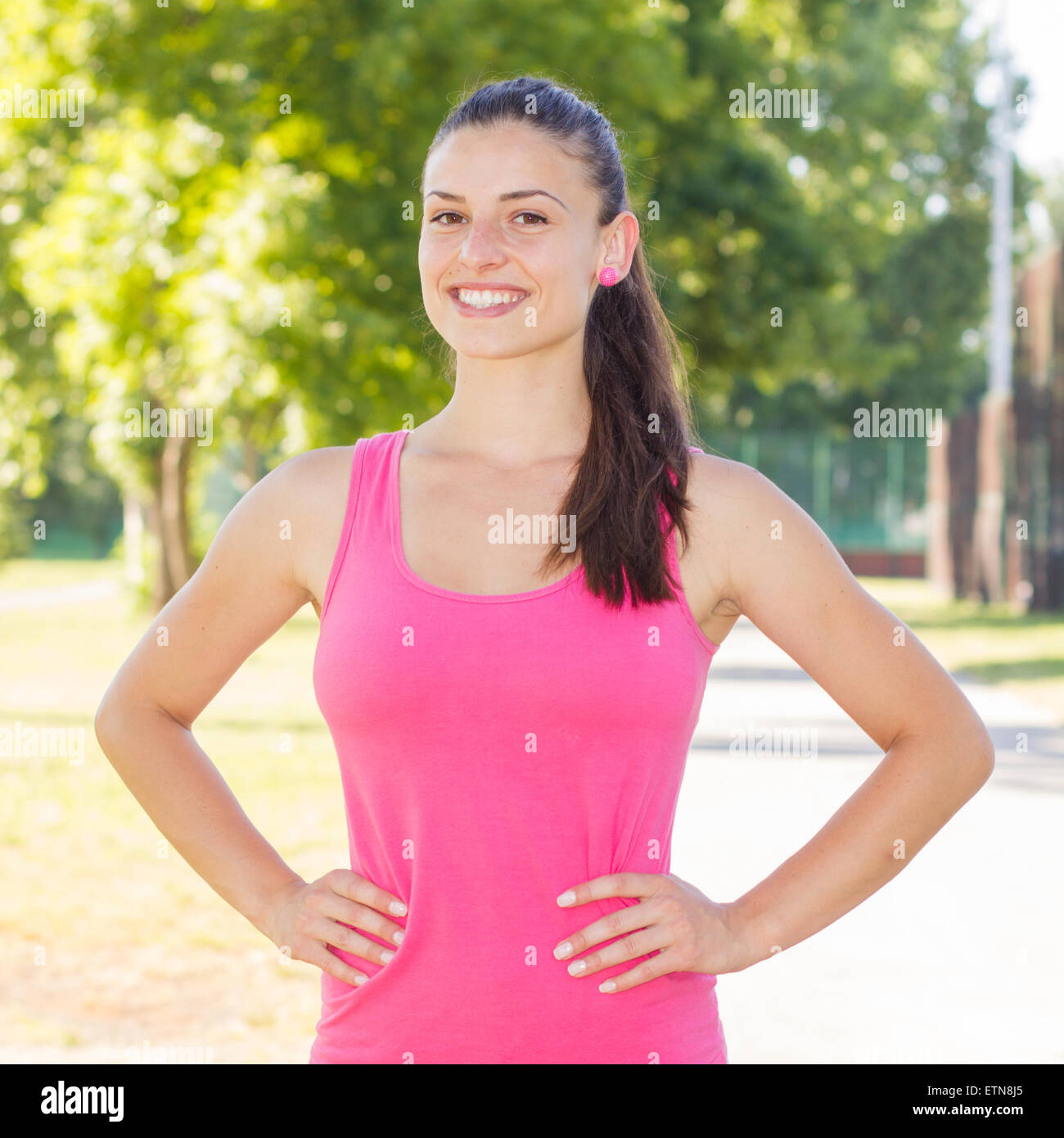 Fitness Healthy Lifestyle Smiling Female posing outdoor Stock Photo - Alamy