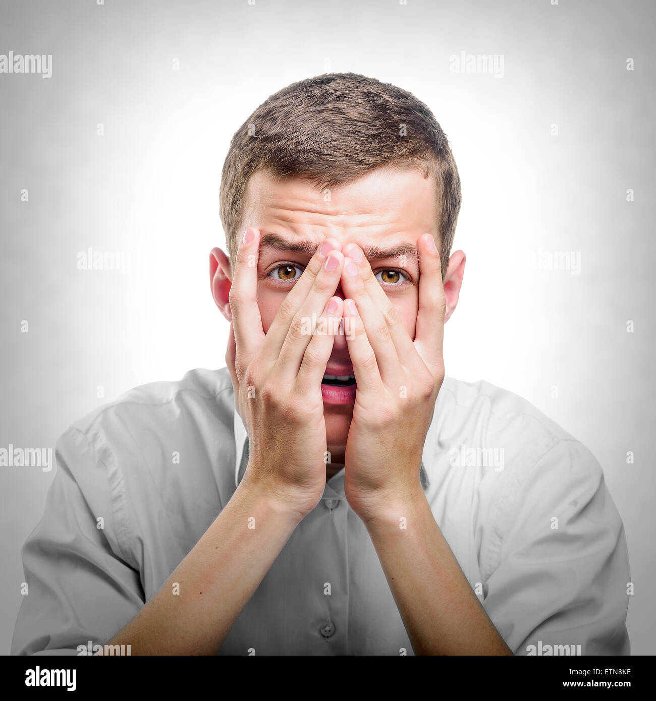 Portrait of amazed man Stock Photo - Alamy
