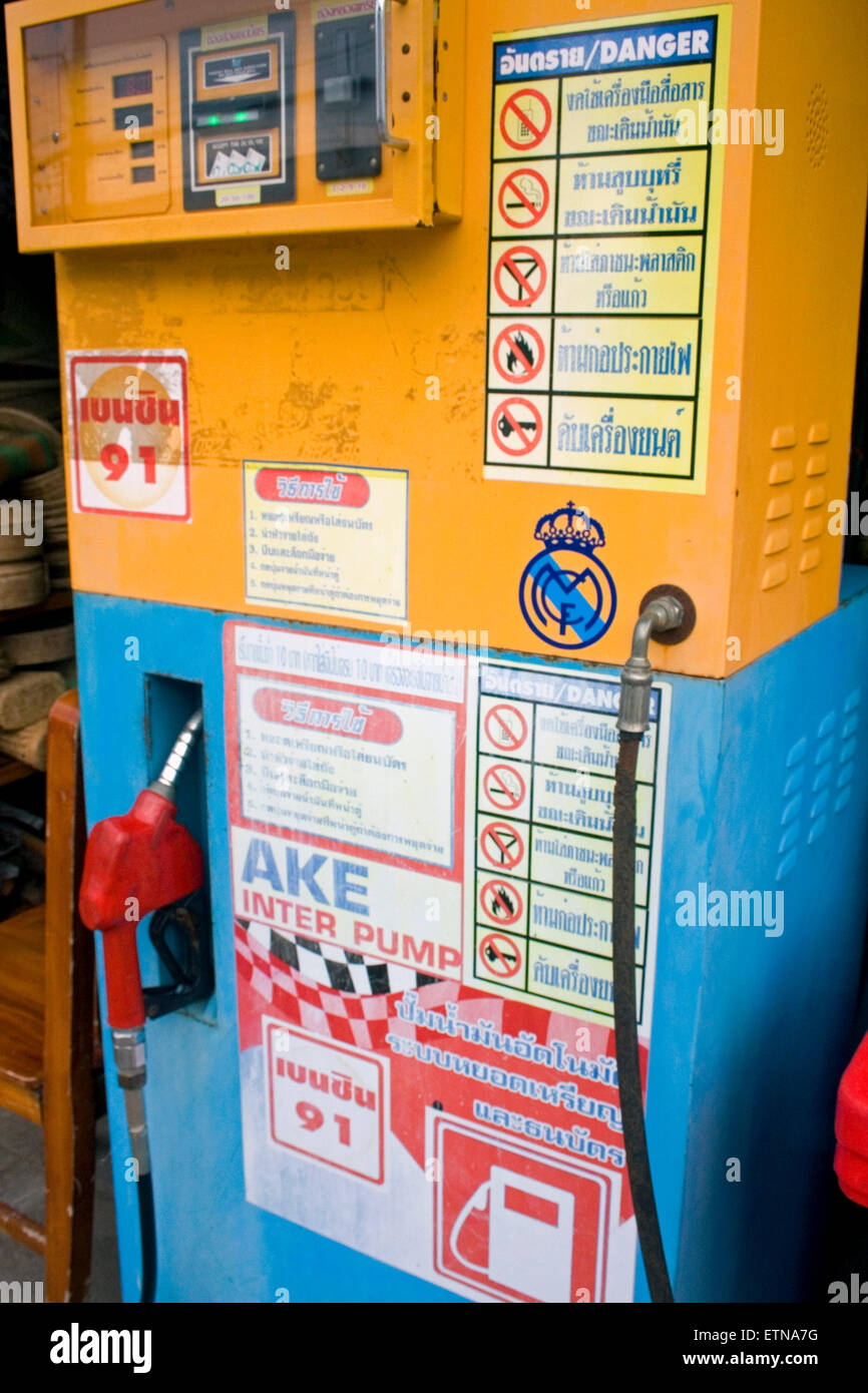 A gasoline pump serves 91 octane gas to residents of Sa Kaeo province ...