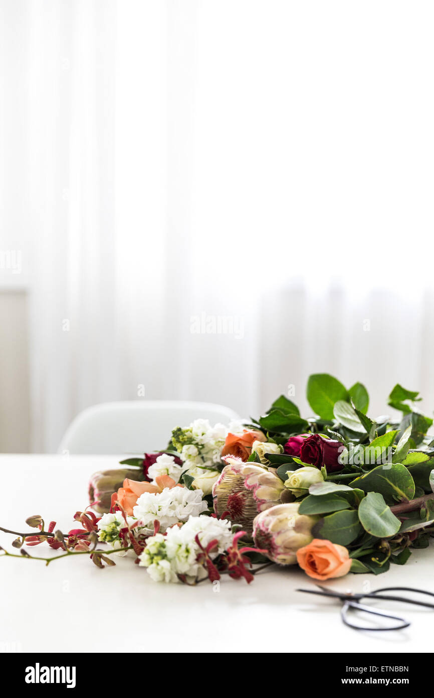 Bunch of Flowers lying on a table Stock Photo - Alamy