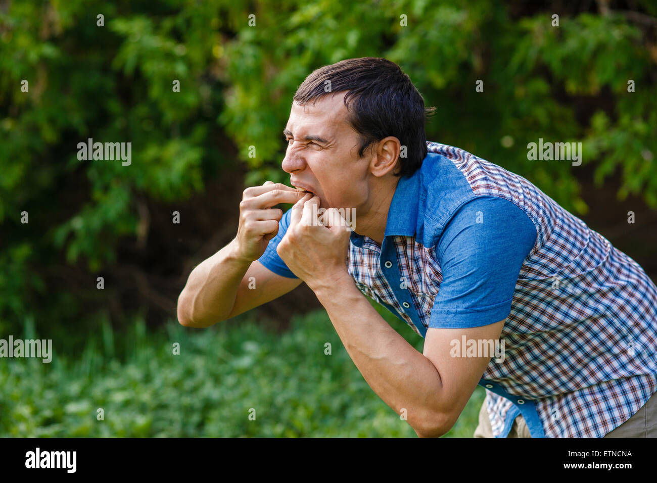 Man on the street nausea vomiting on a green background leaves Stock ...