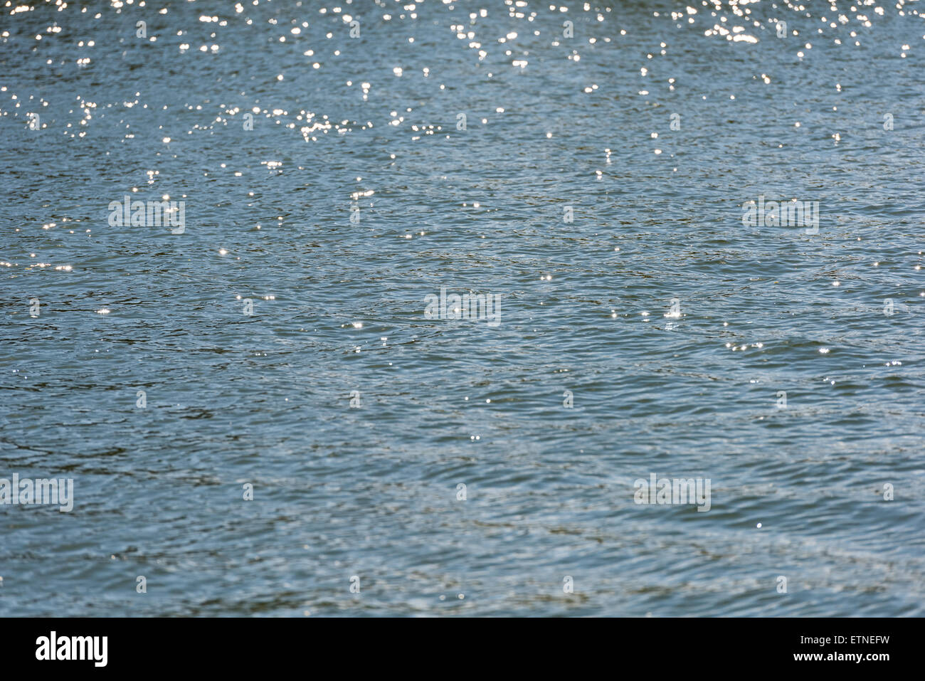 Calm Sea Water Surface In Morning Reflecting Sun Light Stock Photo - Alamy
