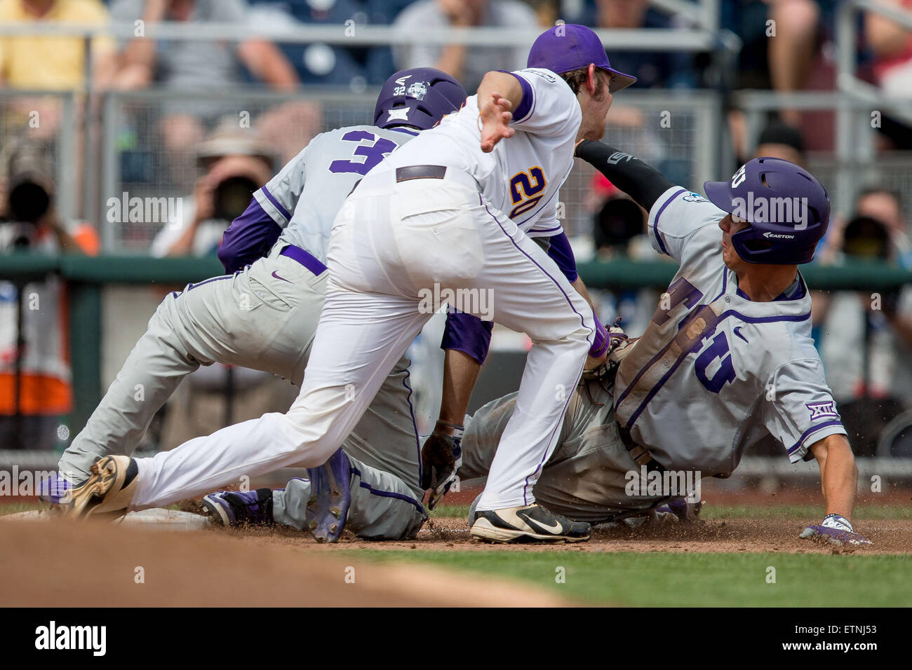 June 14, 2015: LSU Conner Hale #20 tags TCU Jeremie Fagnan #32 and ...