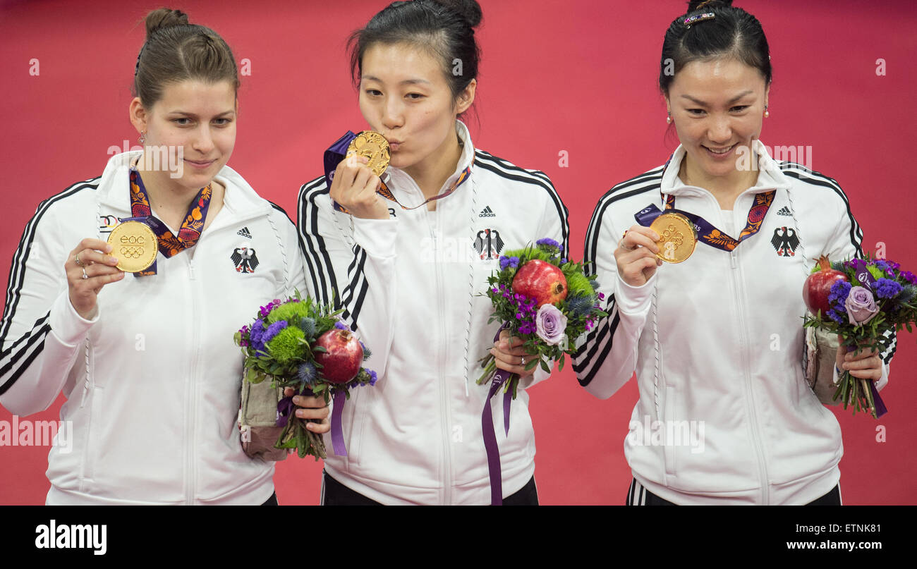 Germany's Petrissa Solja (L-R), Ying Han and Xiaona Shan present their ...