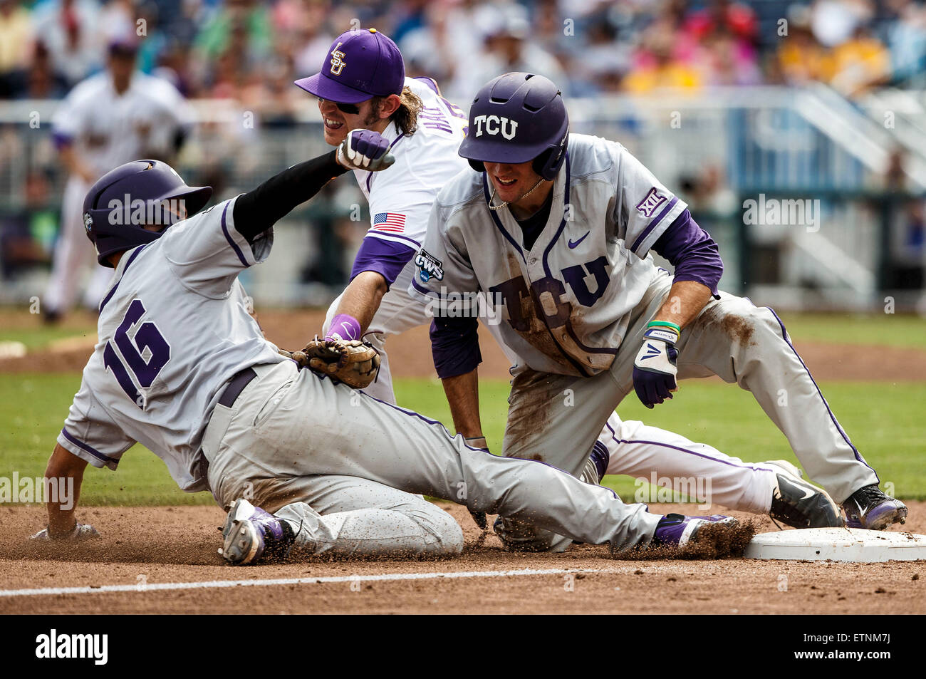 June 14, 2015: LSU 3rd baseman Conner Hale #20 completes the double ...