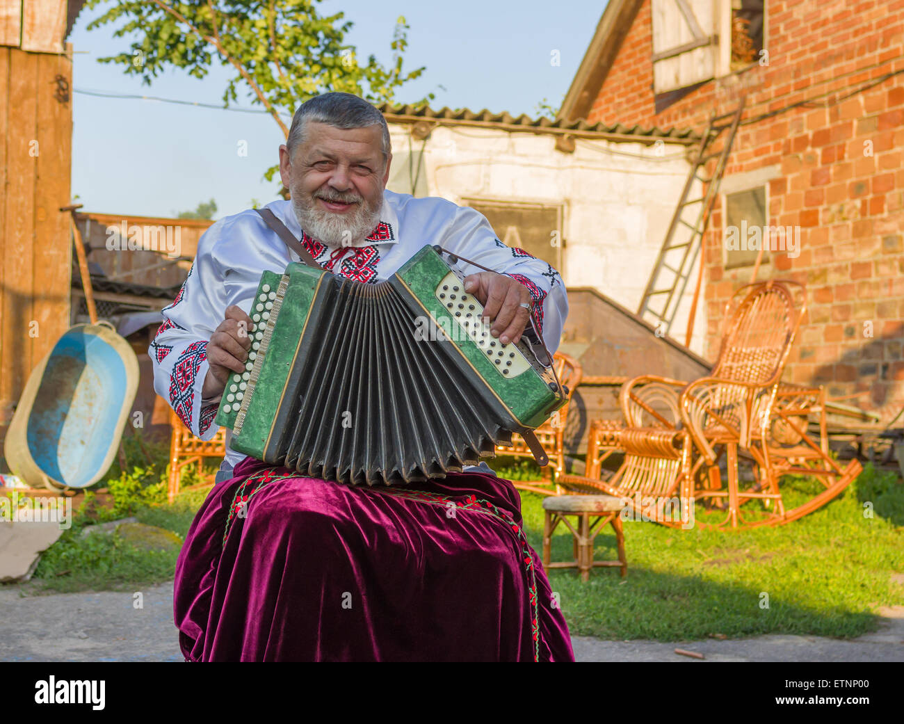 Outdoor portrait of Ukrainian country-man in traditional clothing ...