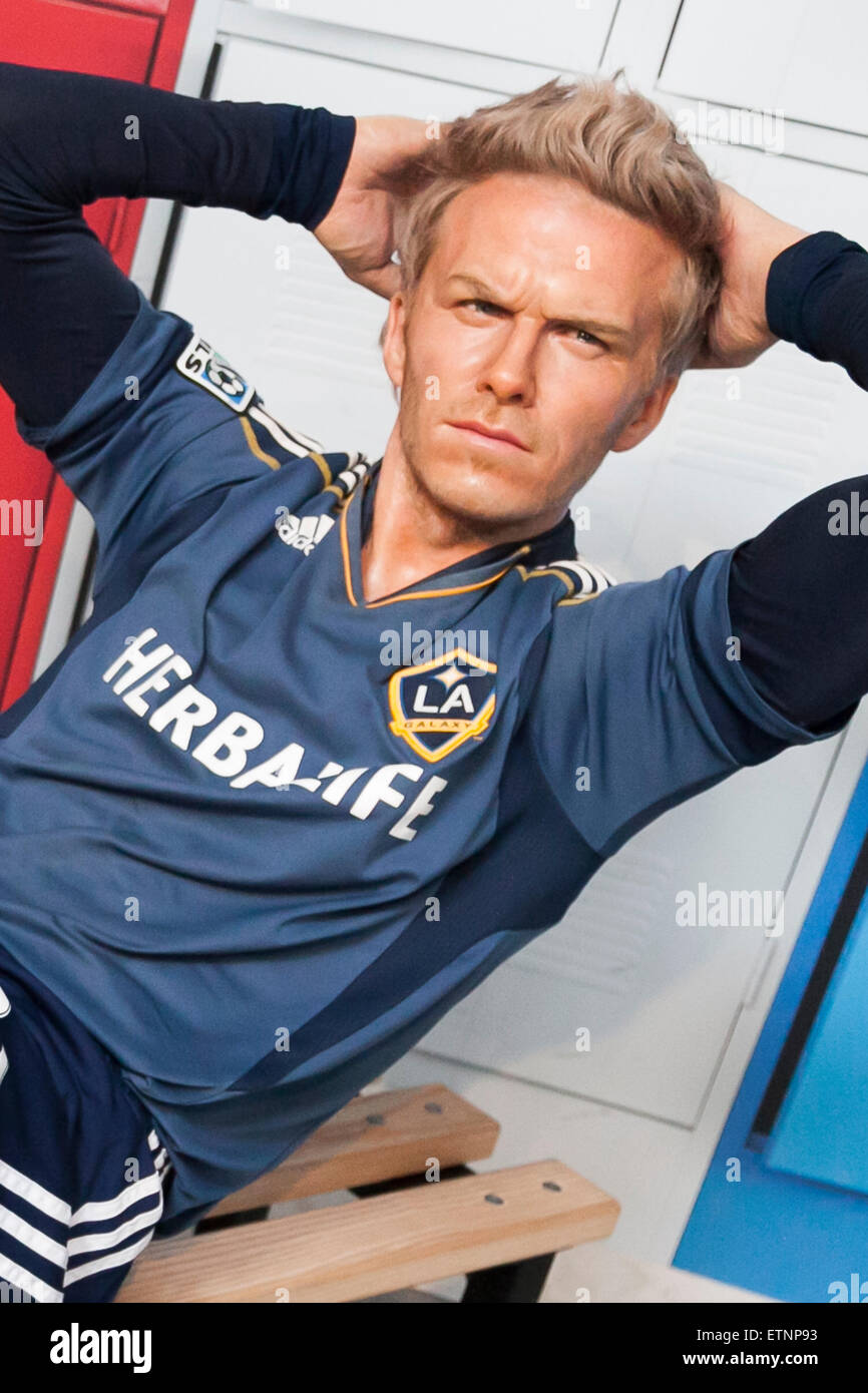 A wax figure of David Beckham, English former footballer on display at ...