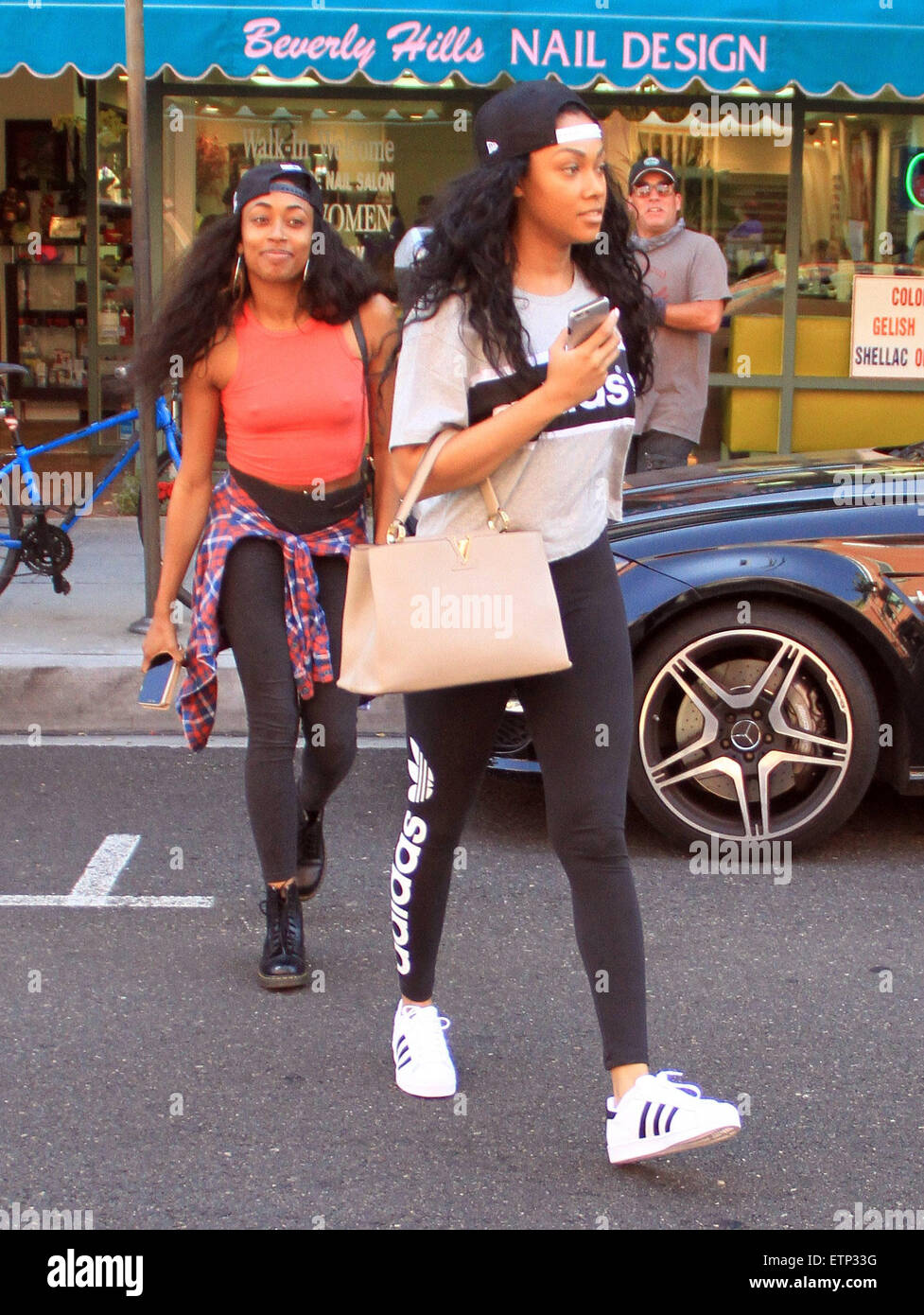 Shayne Murphy leaves a nail salon in Beverly Hills with a friend ...
