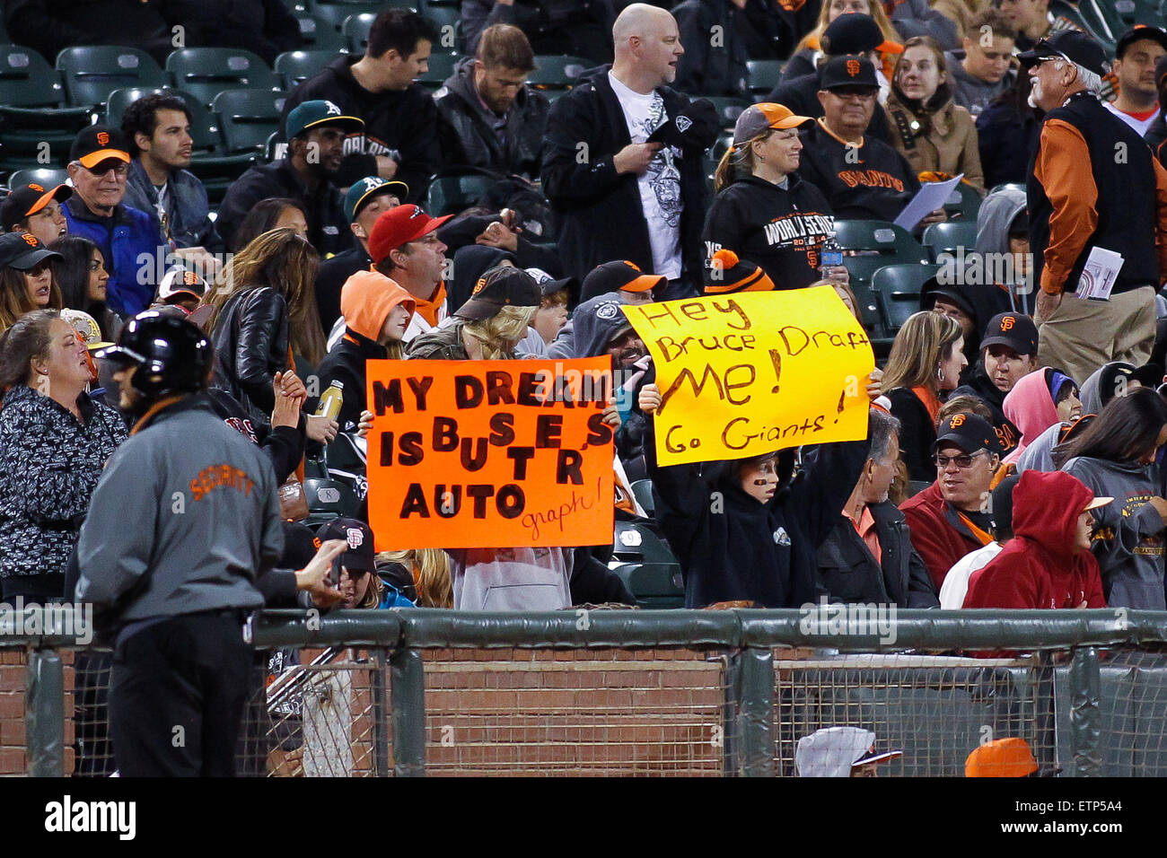 San Francisco, CA. 3rd Apr, 2015. Fans hold up signs during the MLB ...