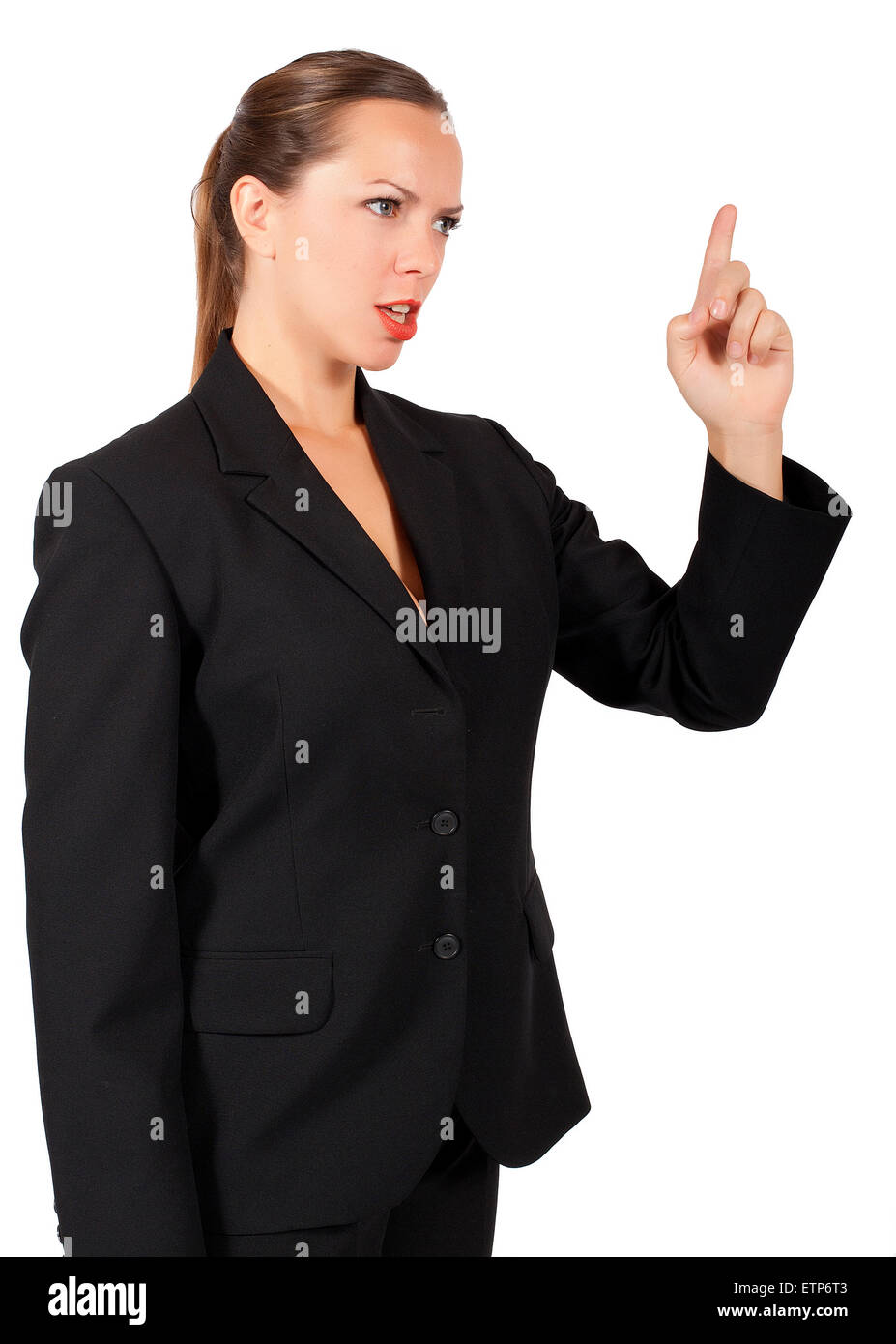 blond woman in a suit holding up one finger Stock Photo - Alamy